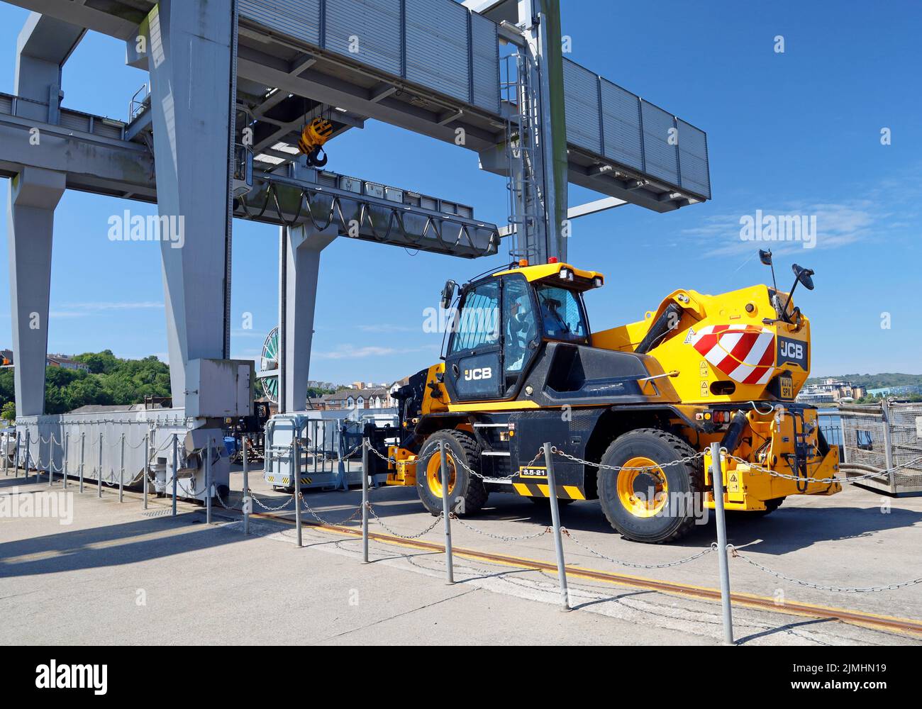 Yellow JCB parked on Cardiff Barrage. Cardiff Barrage views. August ...