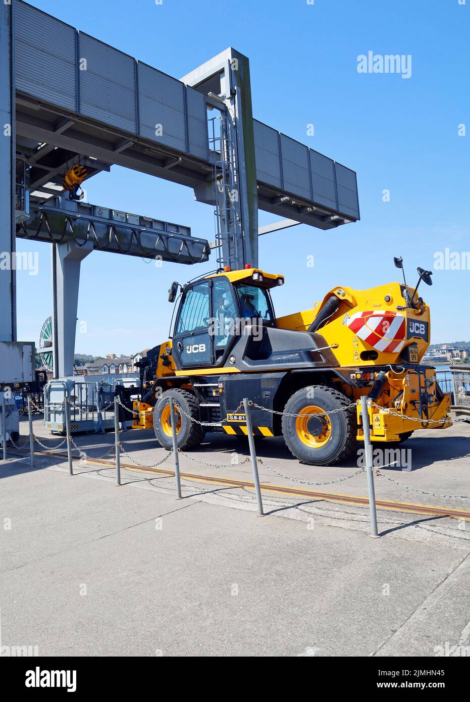 Yellow JCB parked on Cardiff Barrage. Cardiff Barrage views. August ...