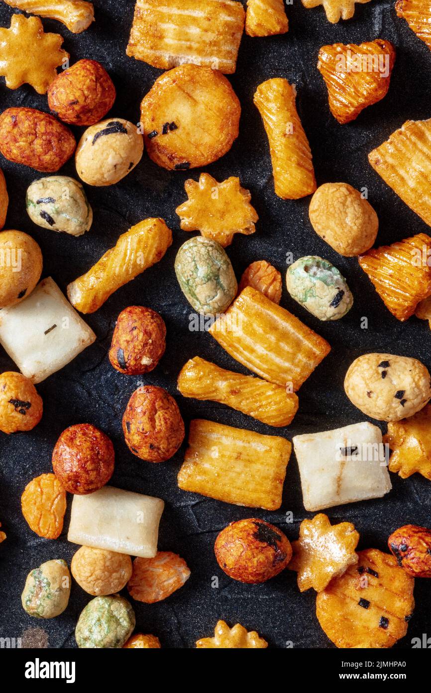 Japanese rice crackers assortment on a black slate background Stock ...