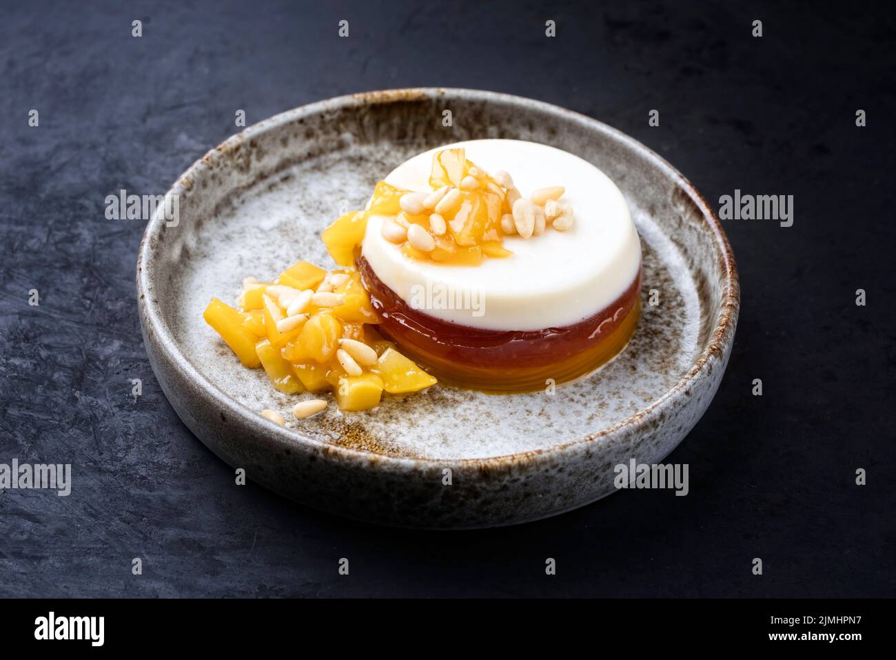 Blancmanger with mango compote Stock Photo - Alamy
