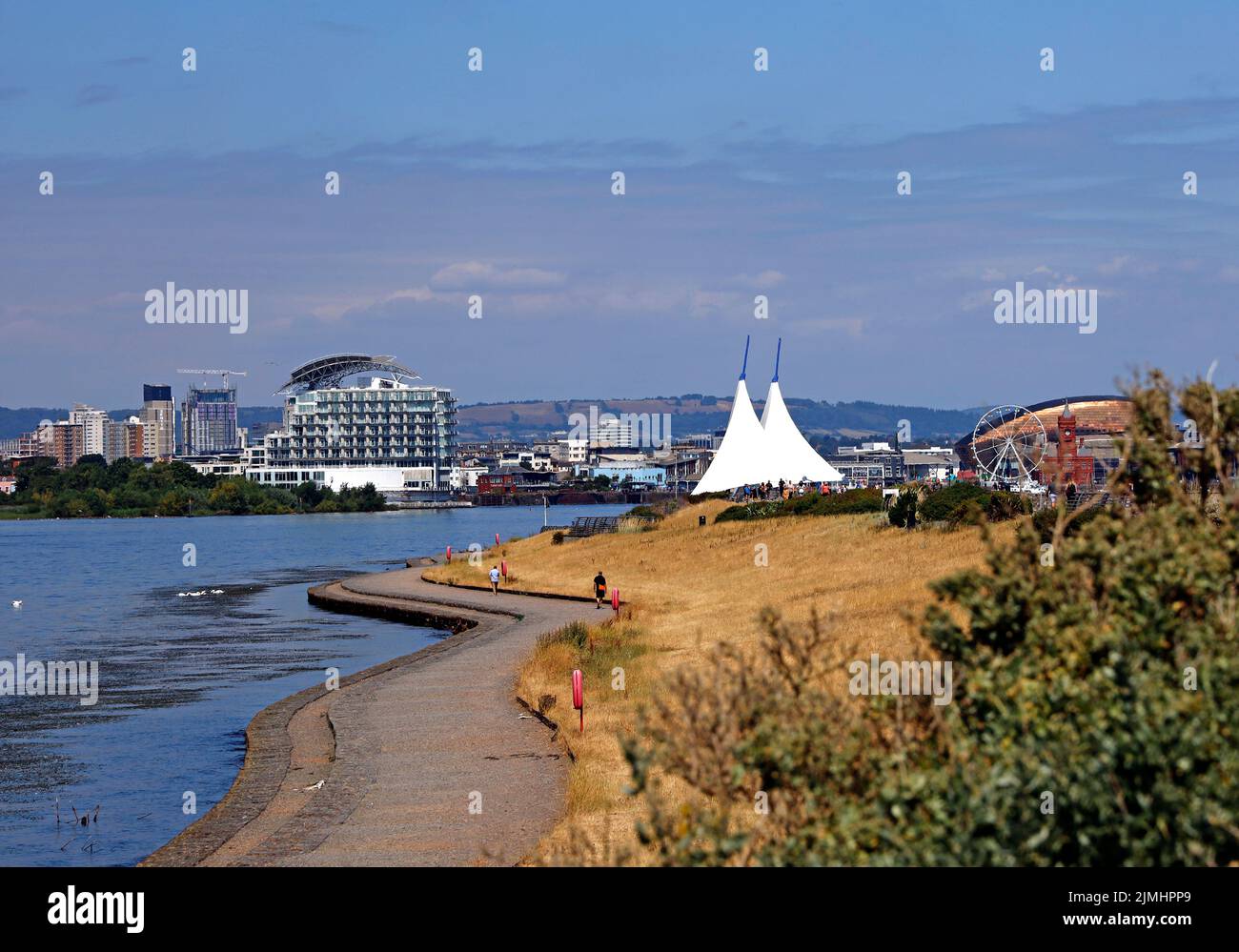 Curved path by Cardiff Bay, looking towards The Barrage Sails and ...