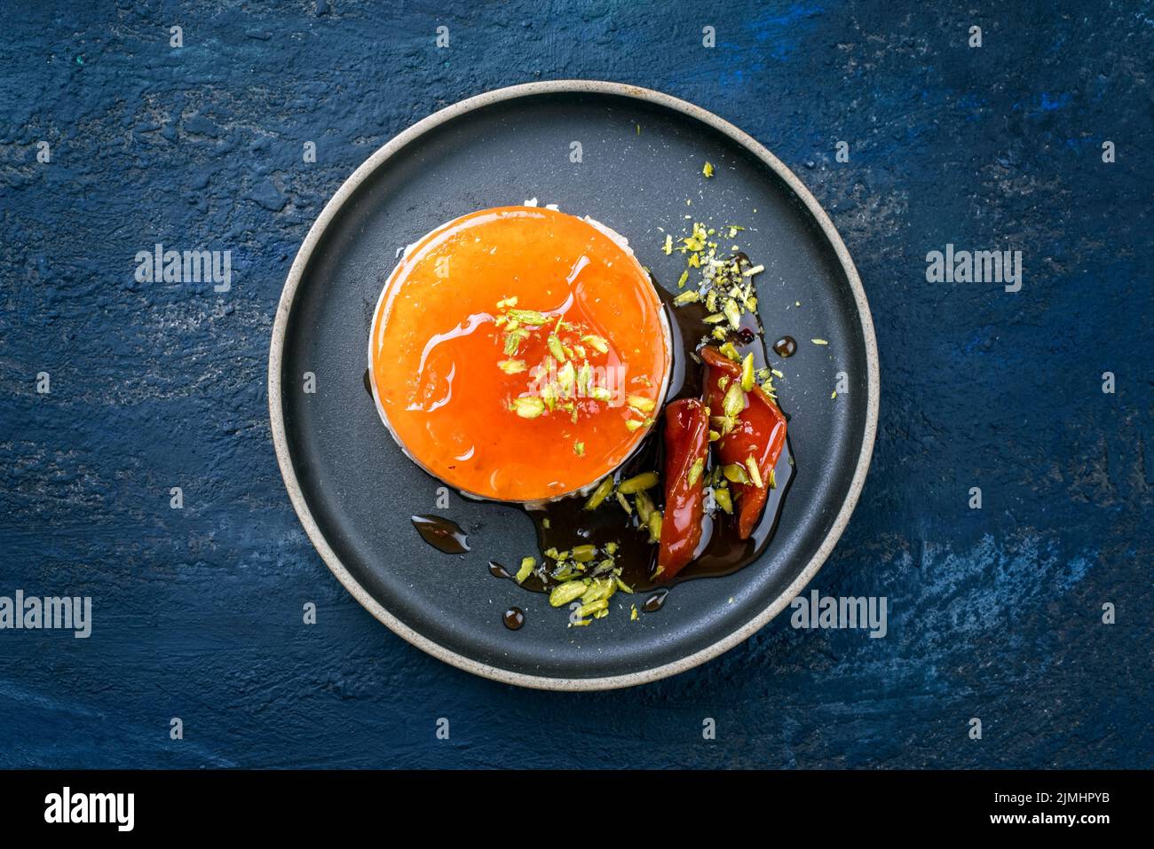 Modern style traditional blancmange almond pudding with quince moraba ...