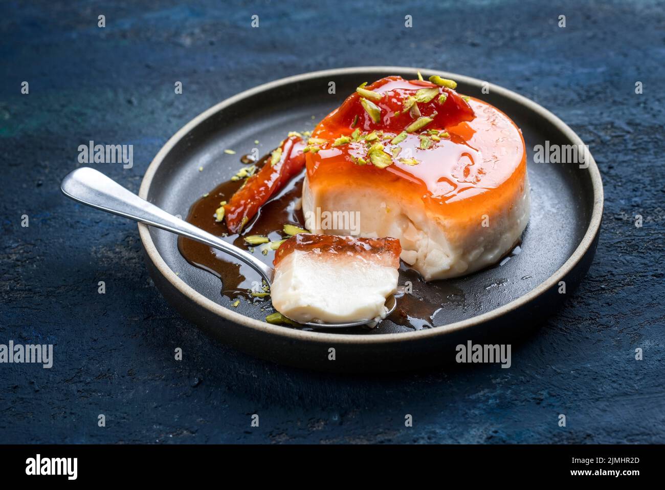 Modern style traditional blancmange almond pudding with quince moraba ...