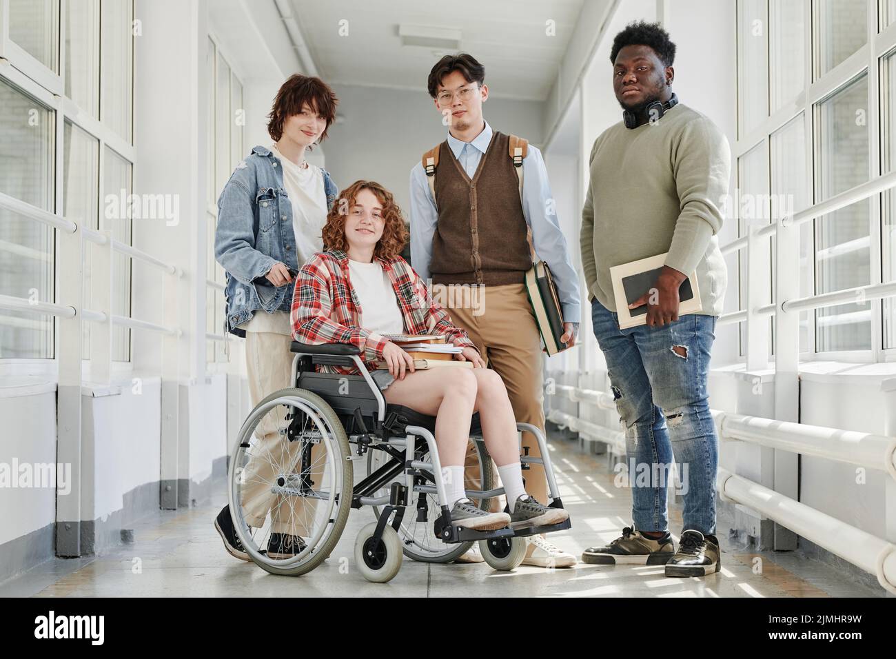 Disabled People In Wheelchairs Working