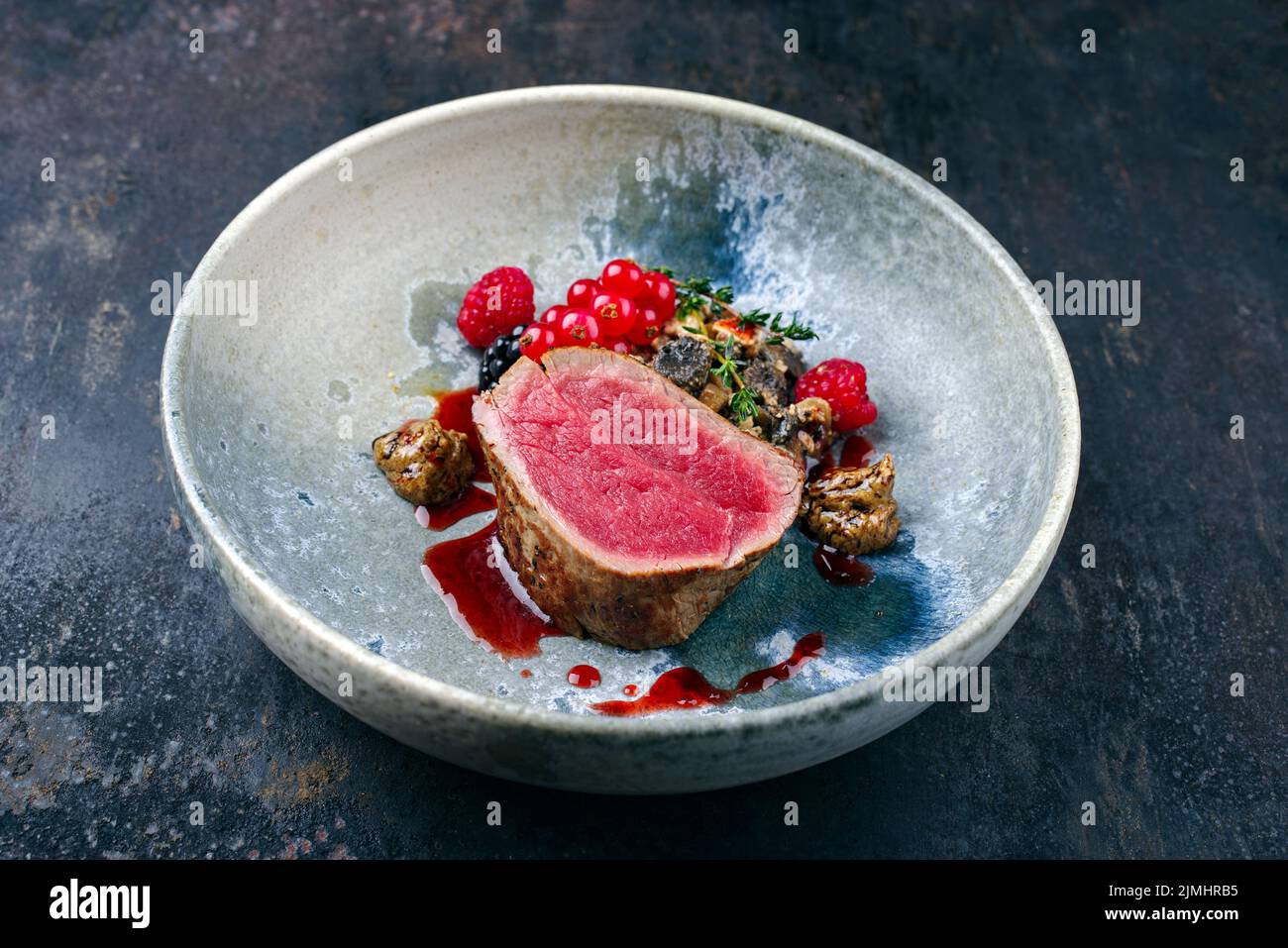 Modern style traditional fried dry aged angus beef filet medaillons ...