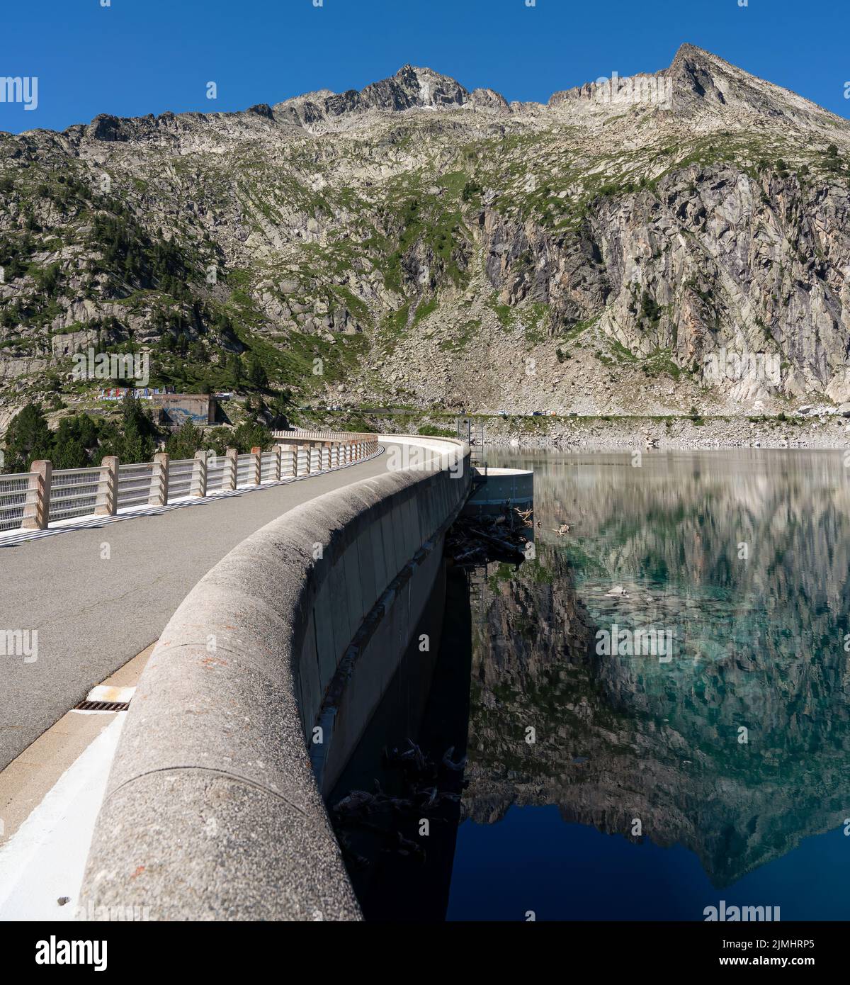 Large concrete reservoir dam wall in sunshine, Barrage dam and Lac de ...