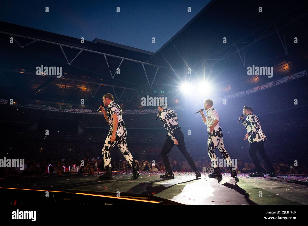 Westlife on stage at Wembley Stadium, London, during their sell-out ...