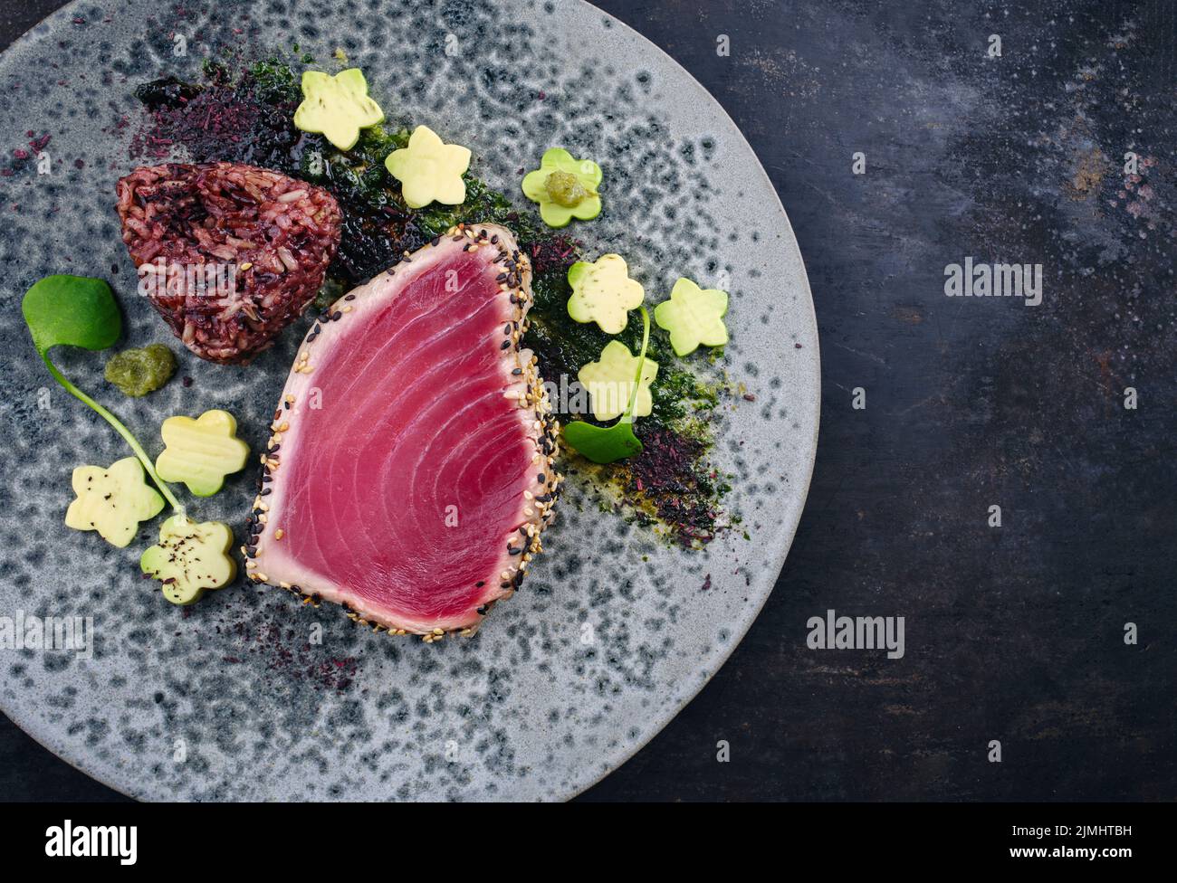 Modern style traditional Japanese gourmet seared tuna fish steak tataki ...