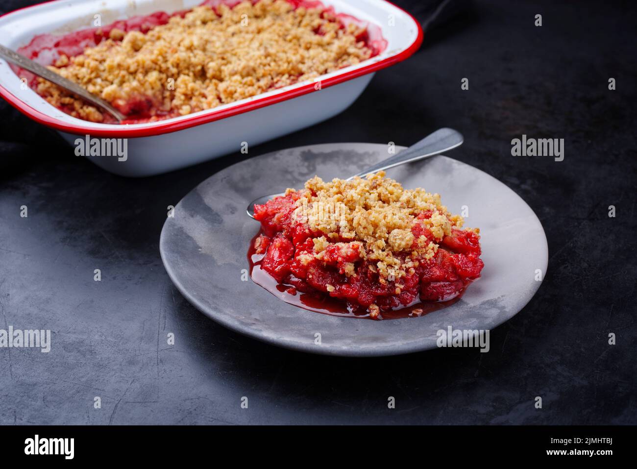 Modern style traditional American crumble cake with rhubarb and apple ...