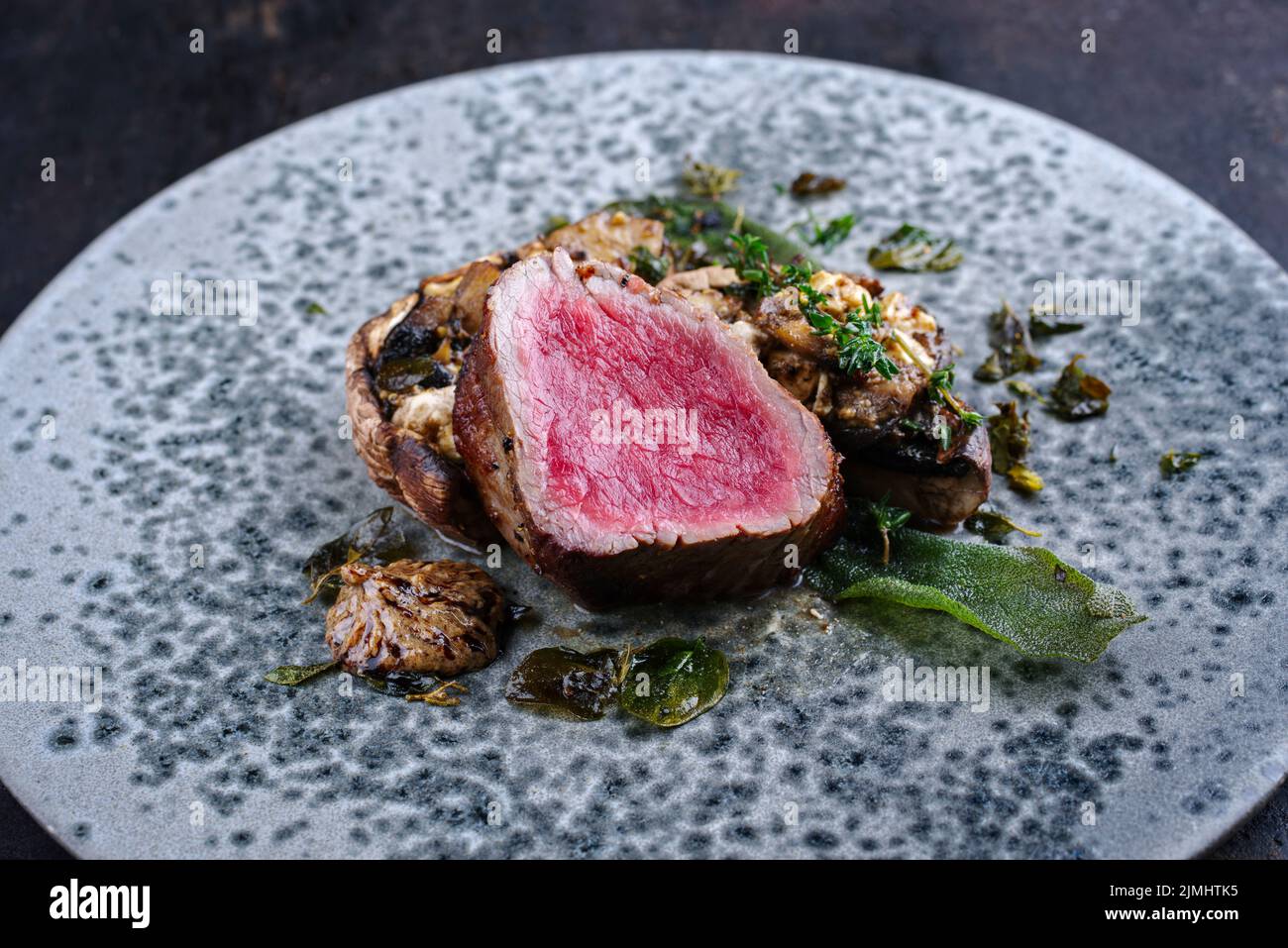 Modern style traditional fried dry aged angus beef filet medaillons ...