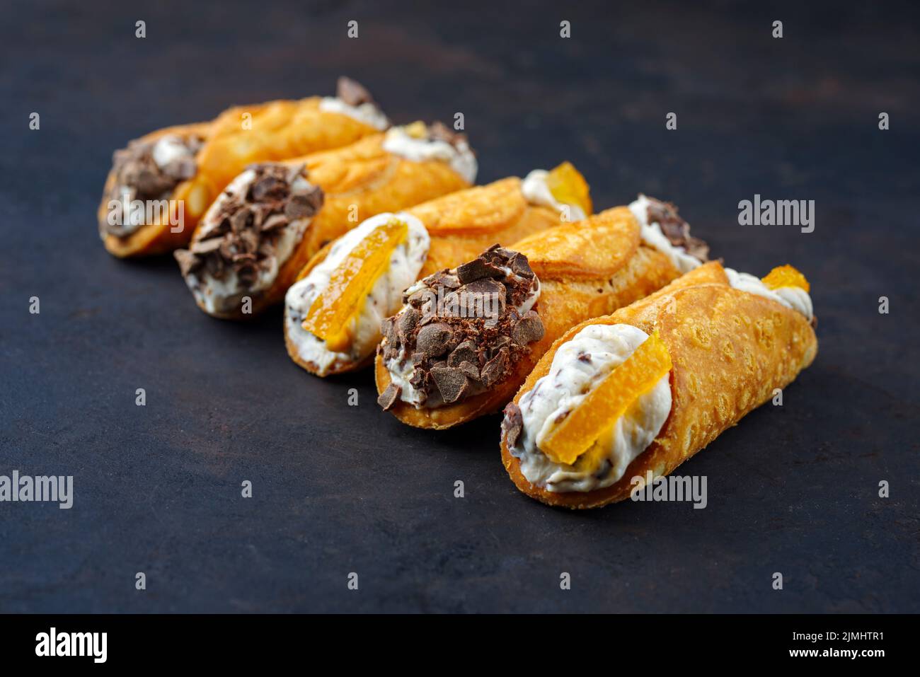 Traditional Italian Sicilian pastry dessert cannoli with creamy ricotta ...