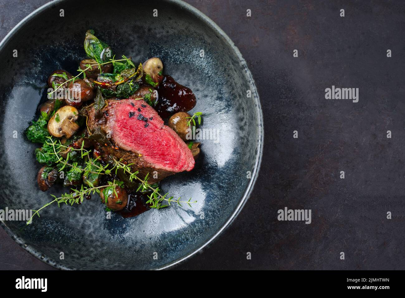 Modern style traditional fried dry aged angus beef filet medaillons ...