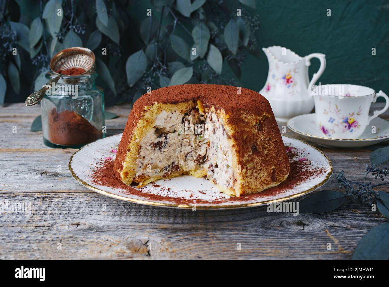 Traditional Italian Panettone cake stuffed with ricotta pudding Stock ...