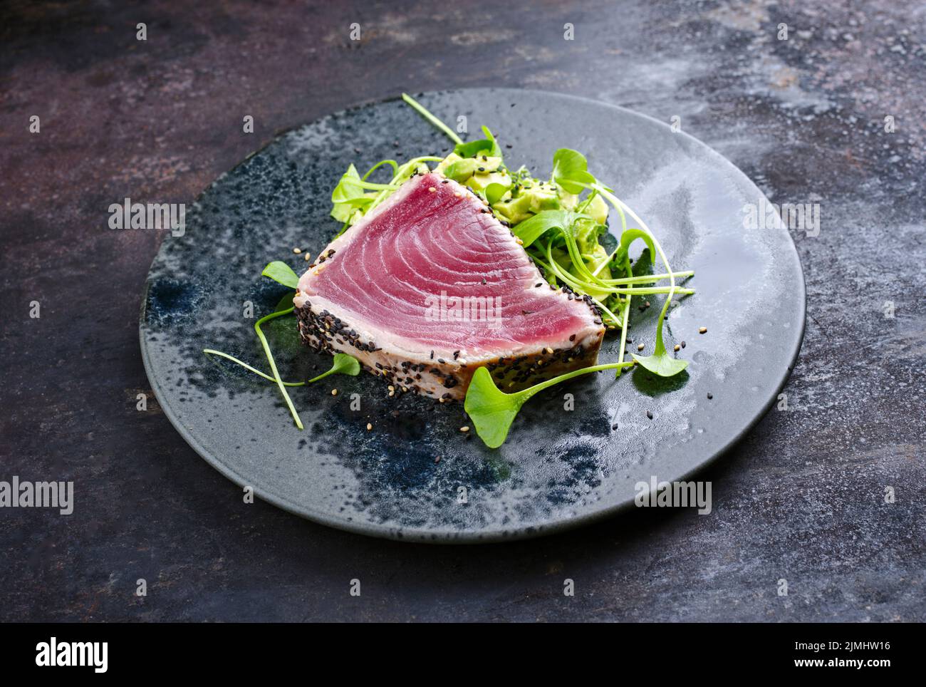 Modern style traditional Japanese gourmet seared tuna fish steak tataki ...