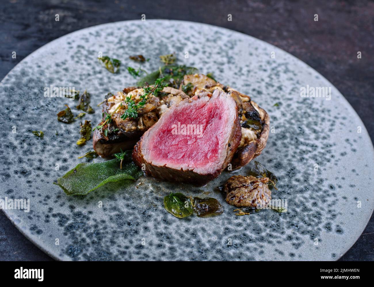 Modern style traditional fried dry aged angus beef filet medaillons ...