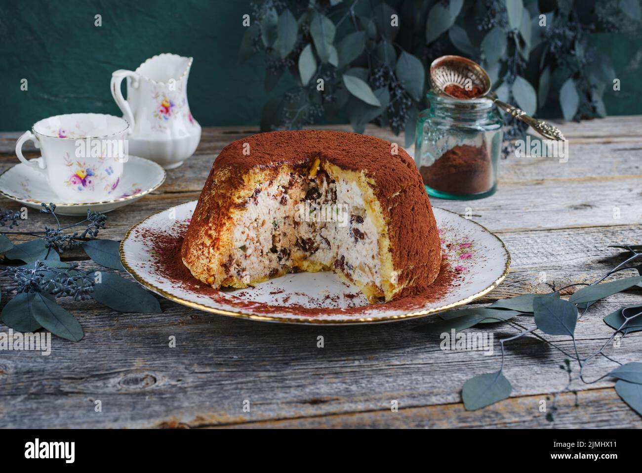 Traditional Italian Panettone cake stuffed with ricotta pudding Stock ...
