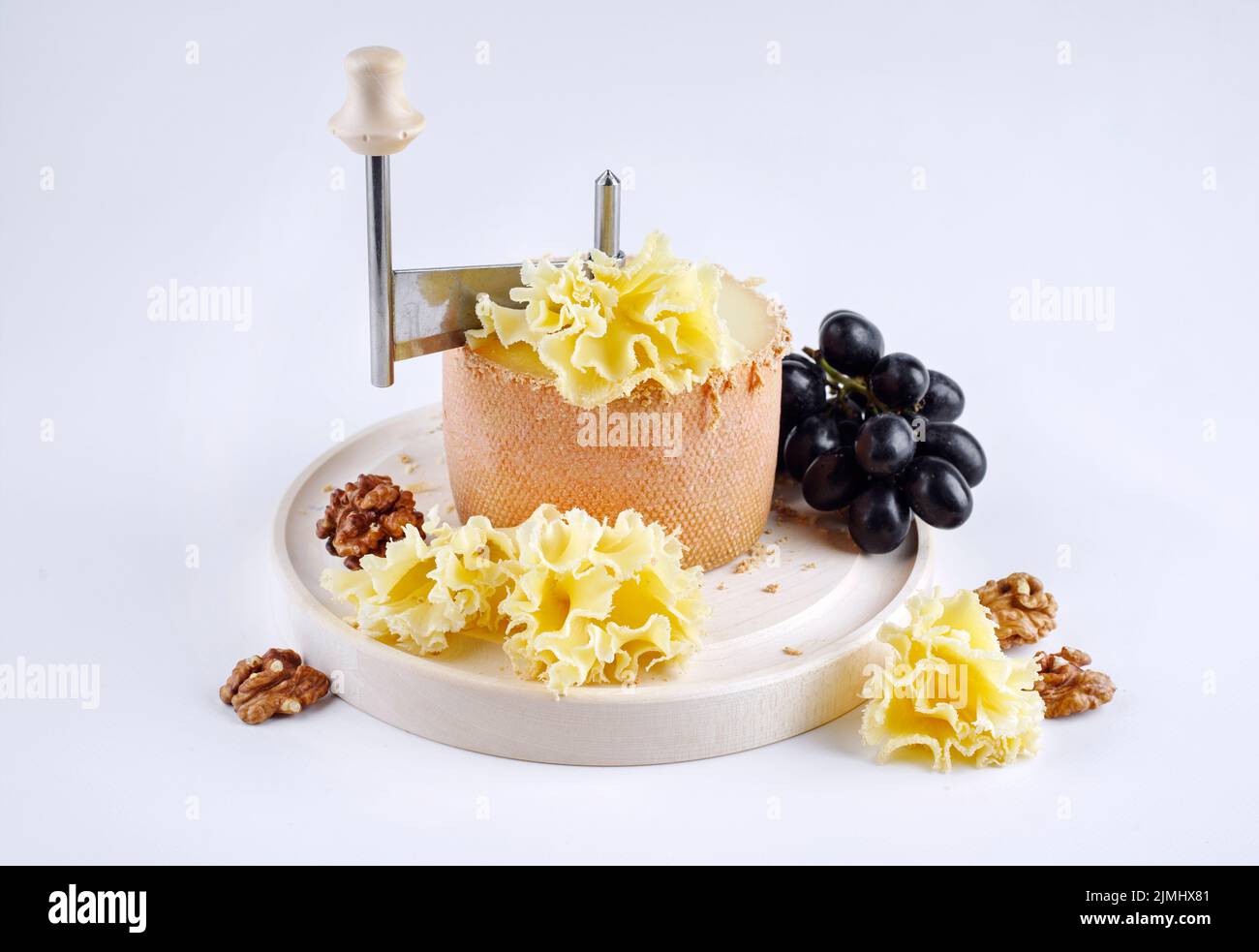 Traditional tete de moine aged mountain cheese of the Alps served with ...