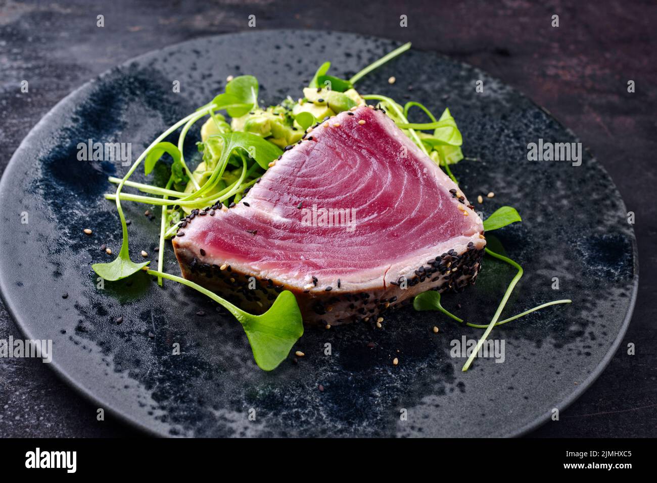Modern style traditional Japanese gourmet seared tuna fish steak tataki ...