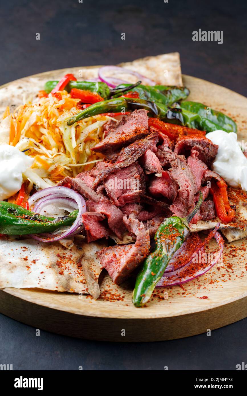 Traditional Greek beef gyros with cabbage carrot salad Stock Photo - Alamy