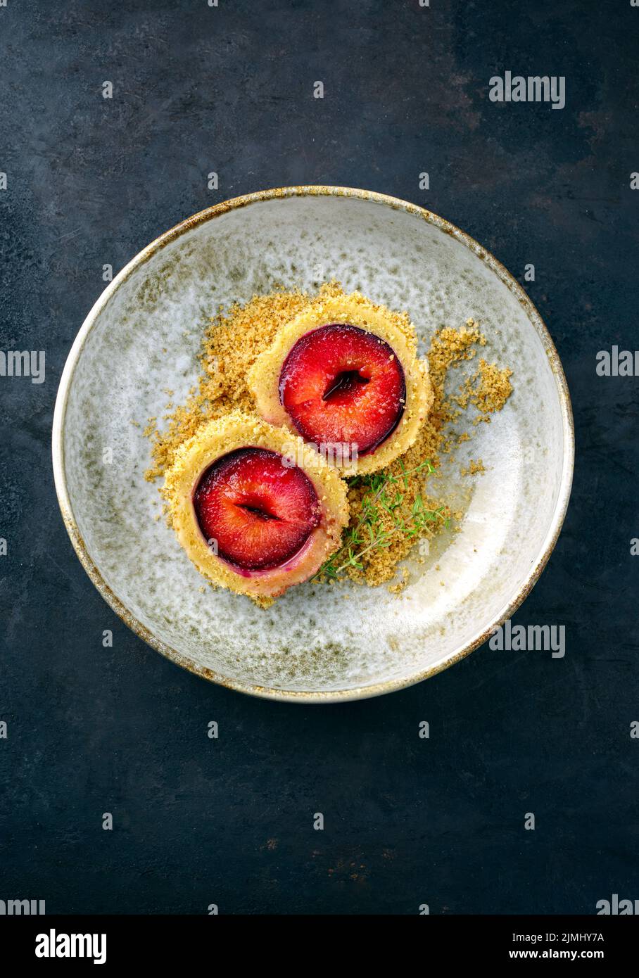 Traditional Austrian plum dumpling with a backed prune in a dough coat ...
