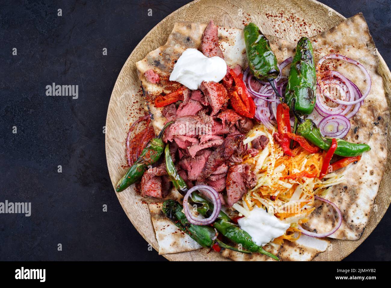 Traditional Greek beef gyros with cabbage carrot salad Stock Photo - Alamy
