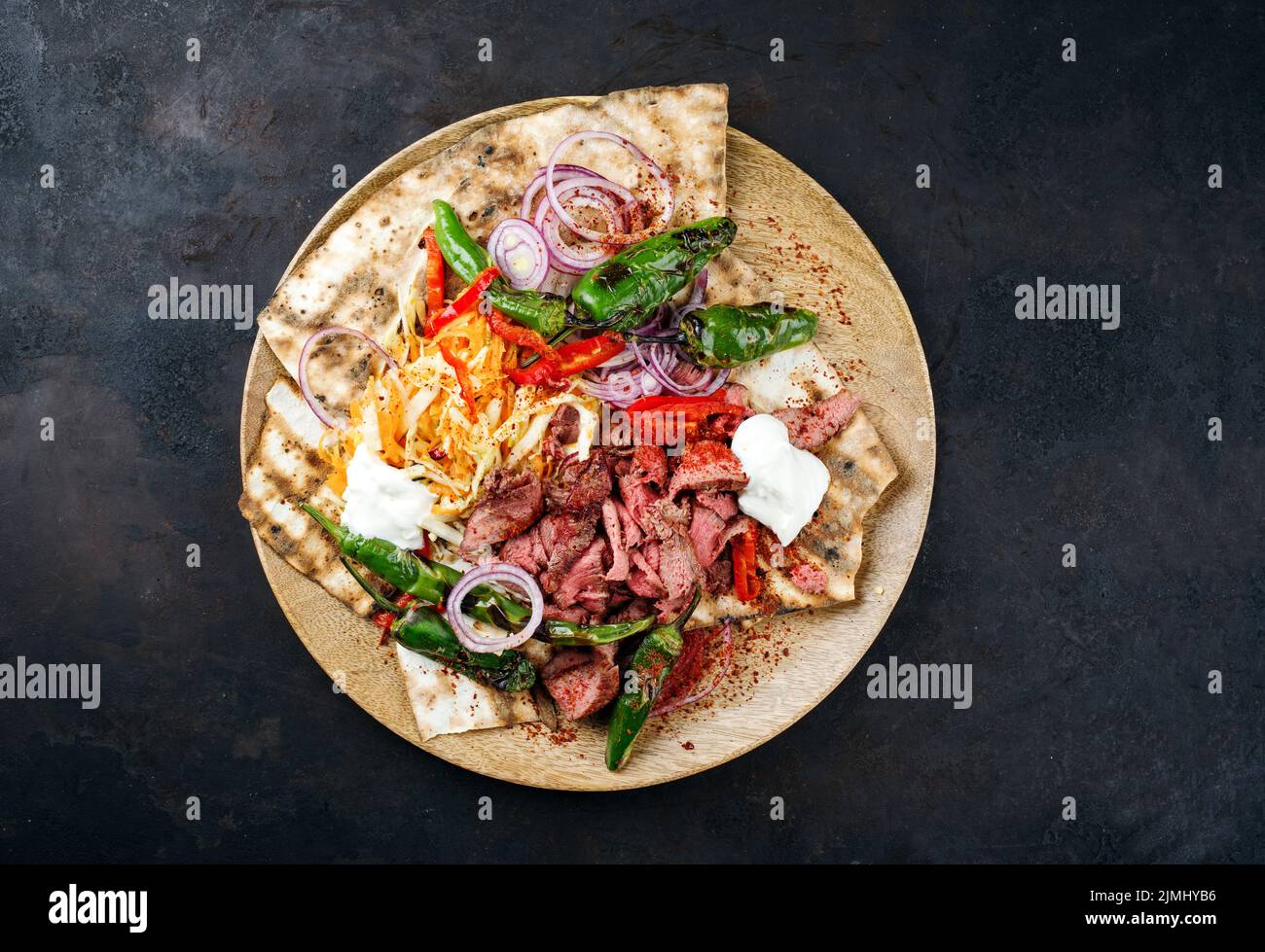 Traditional Greek beef gyros with cabbage carrot salad Stock Photo - Alamy