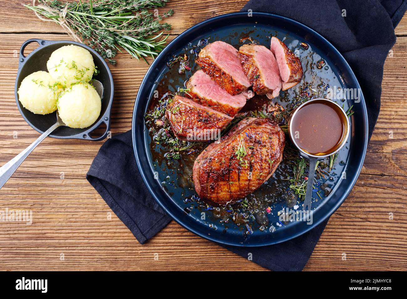 Traditional barbecue gourmet duck breast filet with skin served with ...
