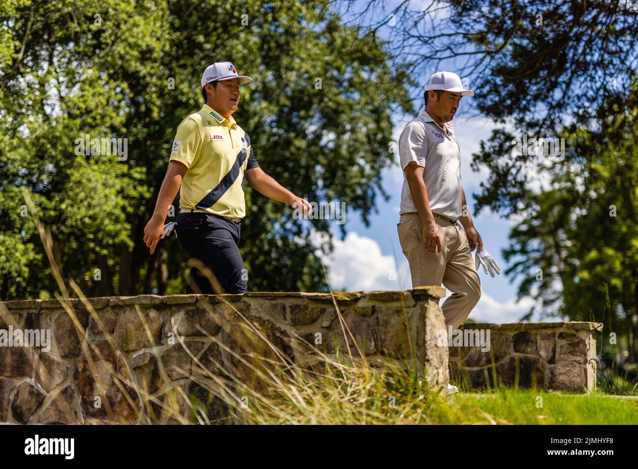 August 6, 2022: Sumgjae Im and John Huh walk across the bridge on nine ...