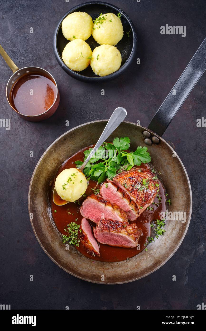 Traditional barbecue gourmet duck breast filet with skin served with ...