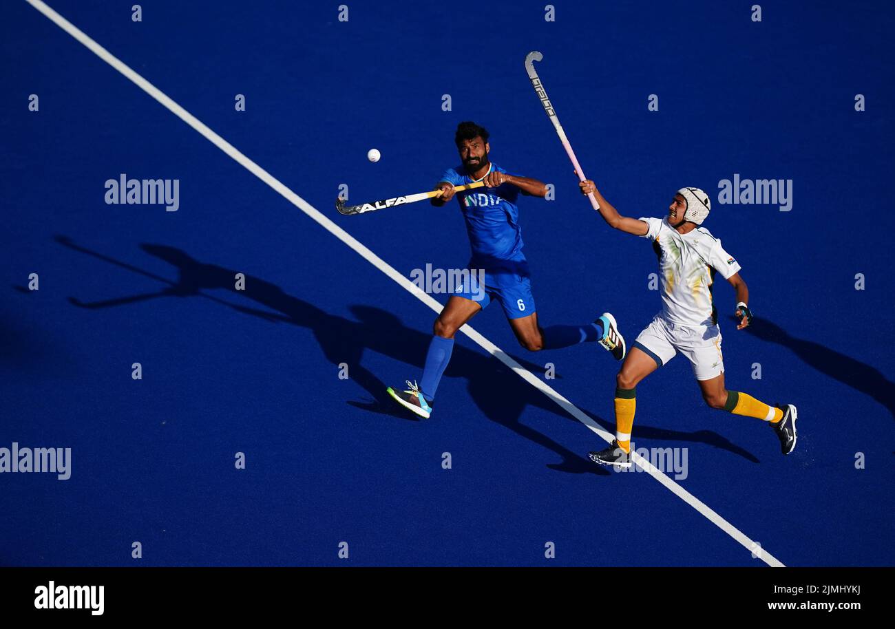 India's Kumar Surender and South Africa's Dayaan Cassiem battle during ...