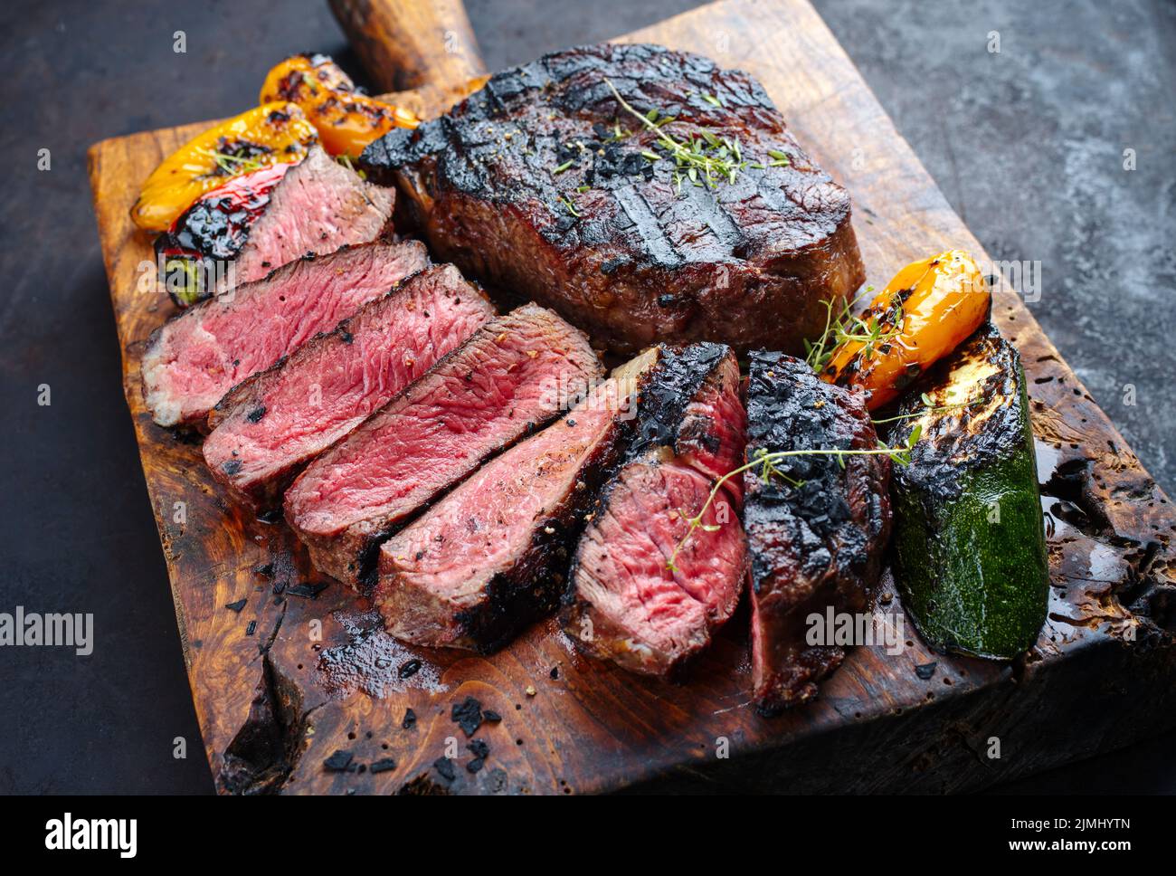 Traditional barbecue dry aged wagyu rib-eye beef steaks served with ...