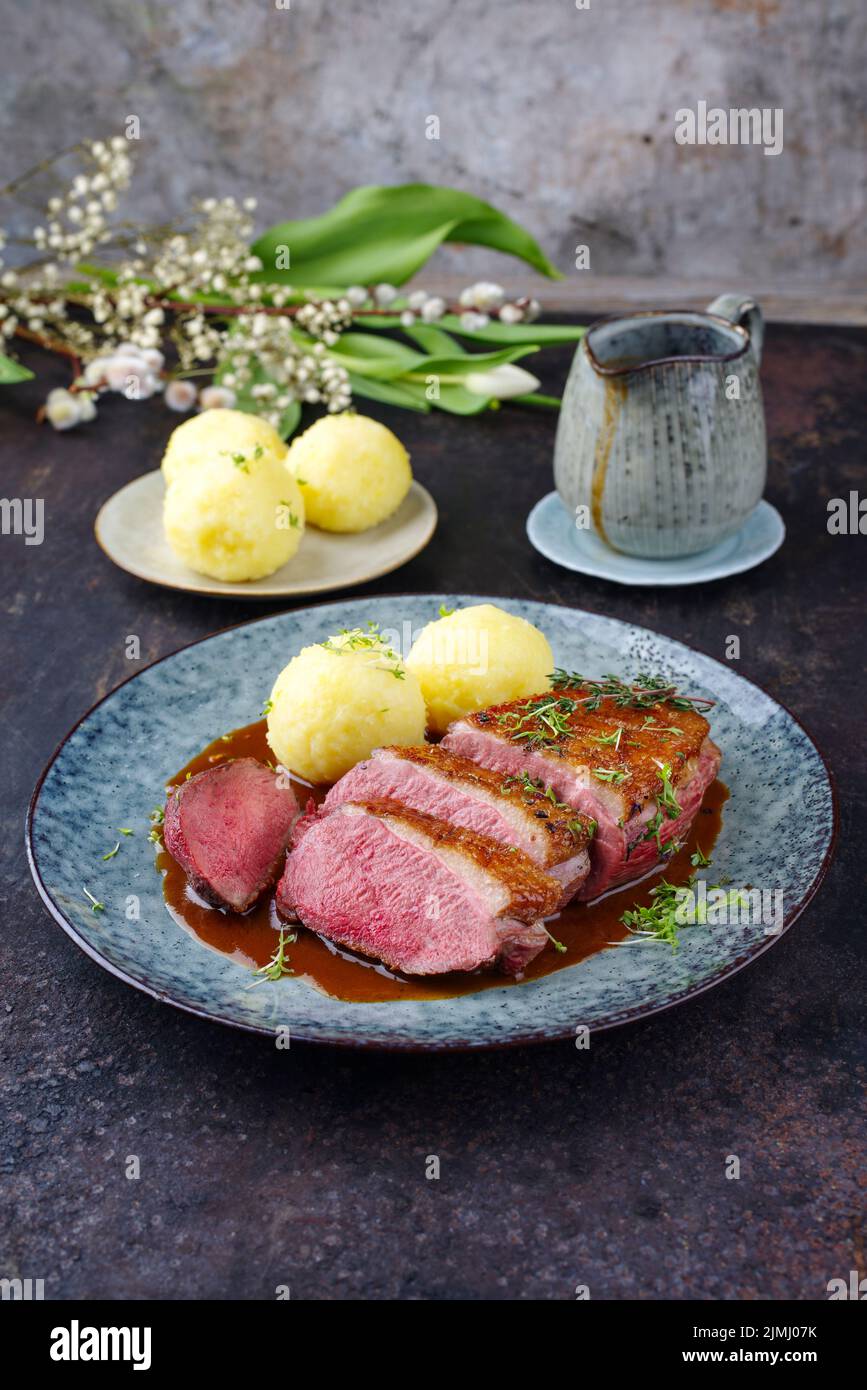 Traditional barbecue gourmet duck breast filet with skin served with ...