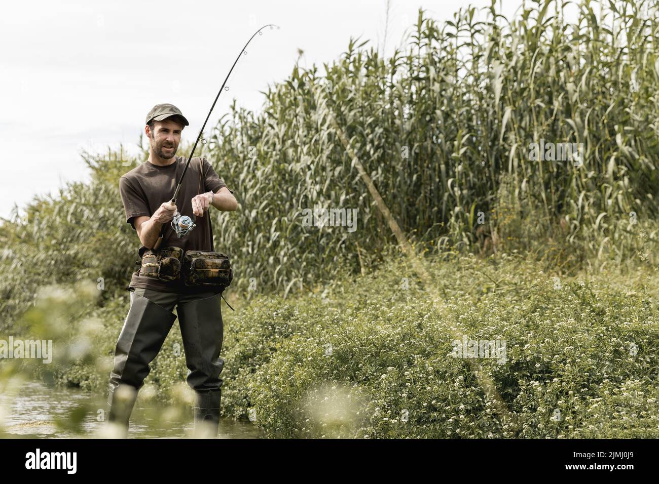 Man fishing river Stock Photo - Alamy