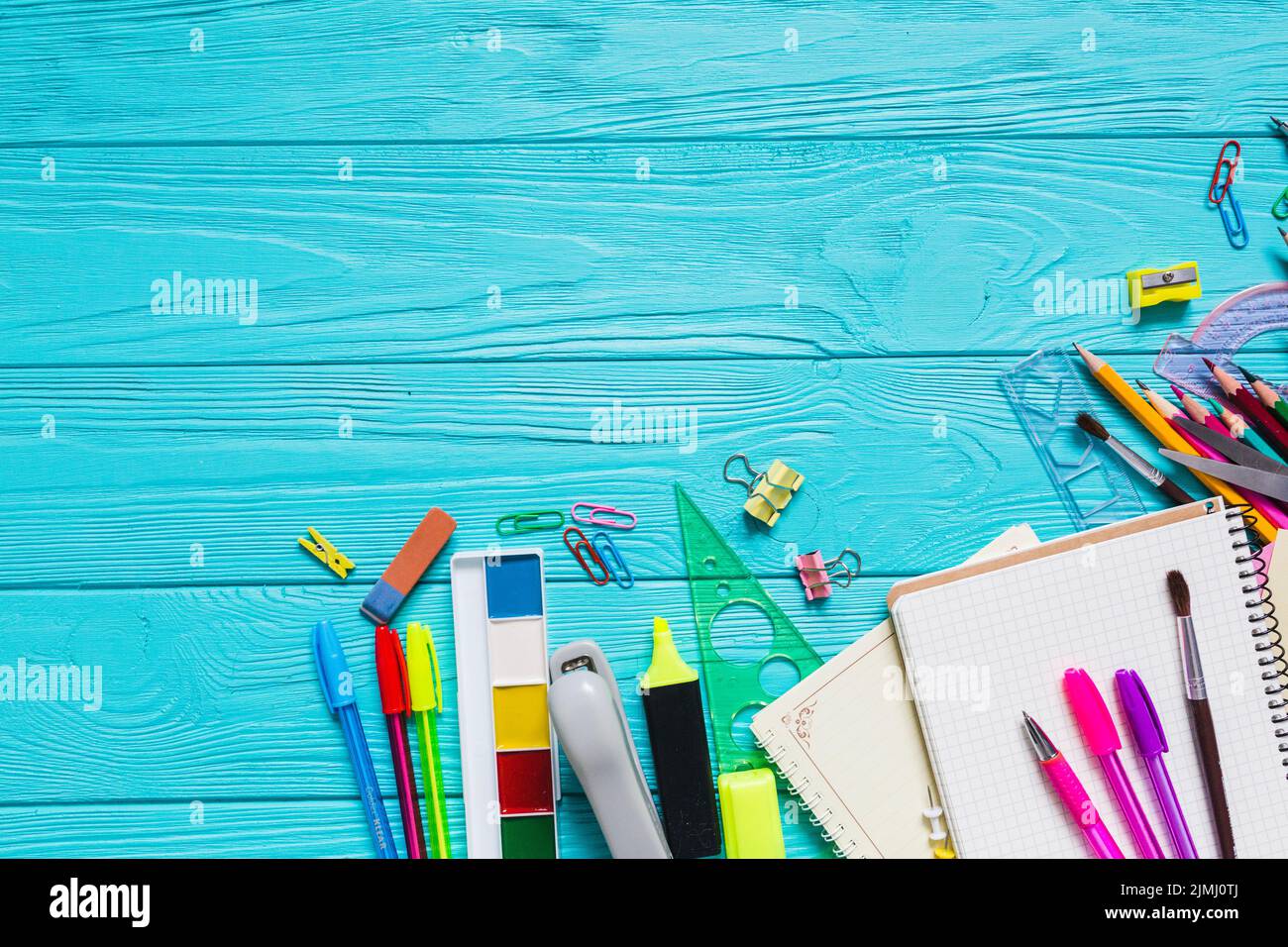 School materials colorful table Stock Photo - Alamy