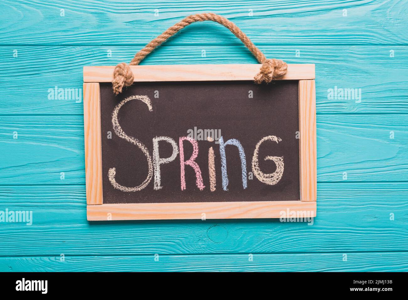 Blackboard with spring writing Stock Photo - Alamy