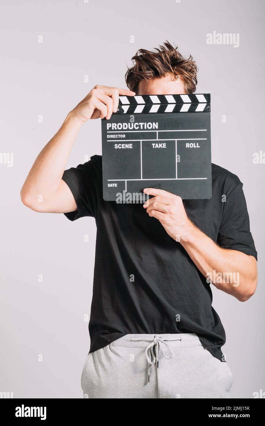 Black guy hiding face hand hi-res stock photography and images - Alamy