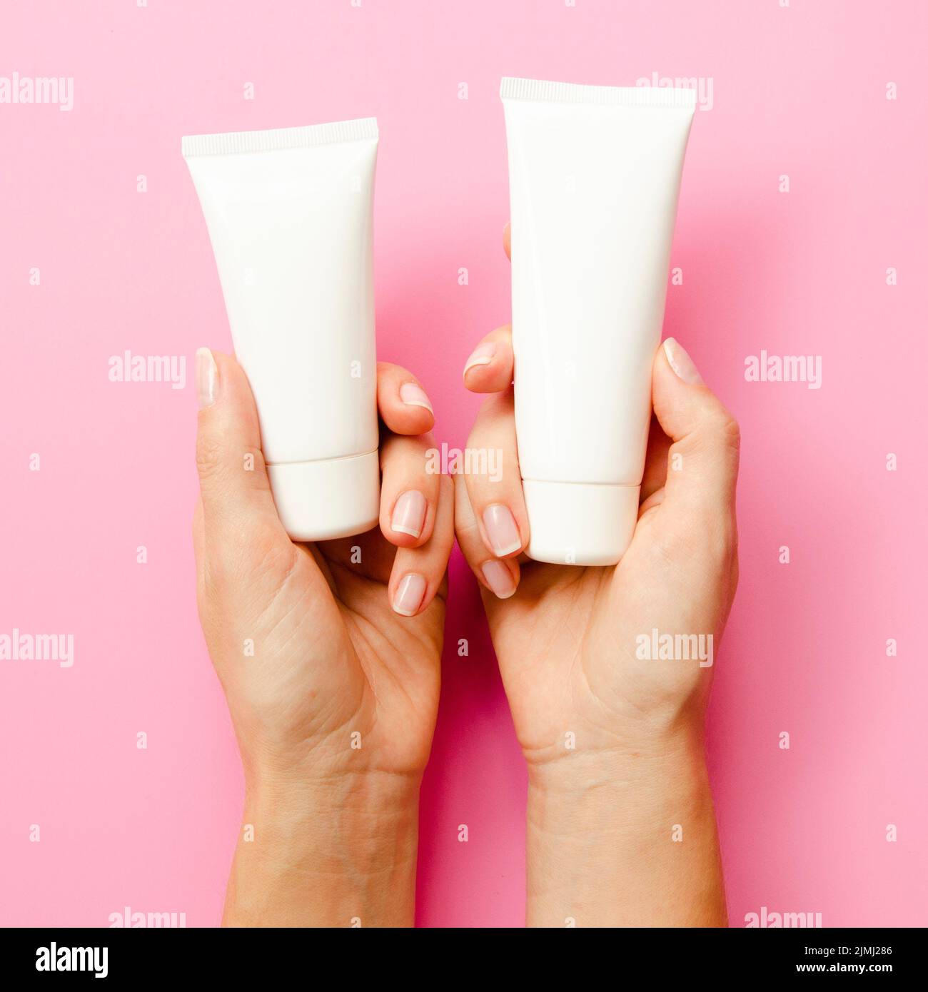 Woman apply sun cream hand hi-res stock photography and images - Alamy