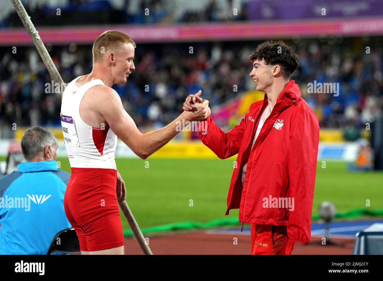 England's Adam Hague (left) shake hands with Owen Heard during the Men ...