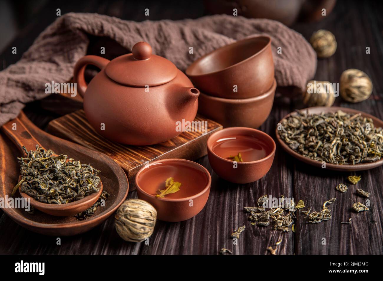 Tea pot cups desk Stock Photo - Alamy