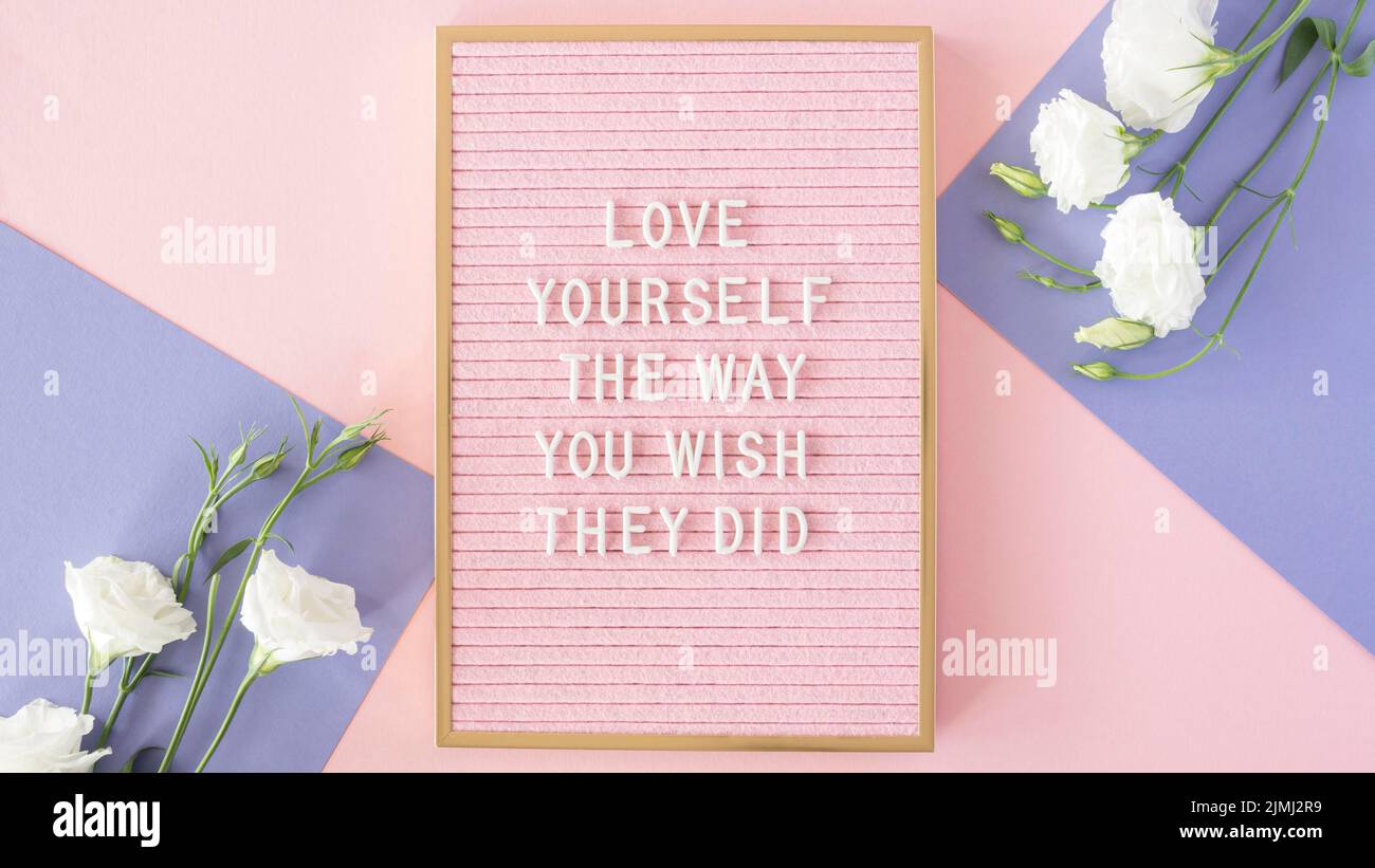 Pink motivational text board view Stock Photo - Alamy
