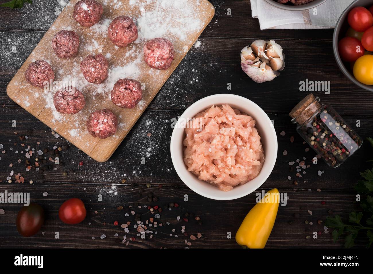 Flat lay meatballs wooden board minced meat Stock Photo - Alamy