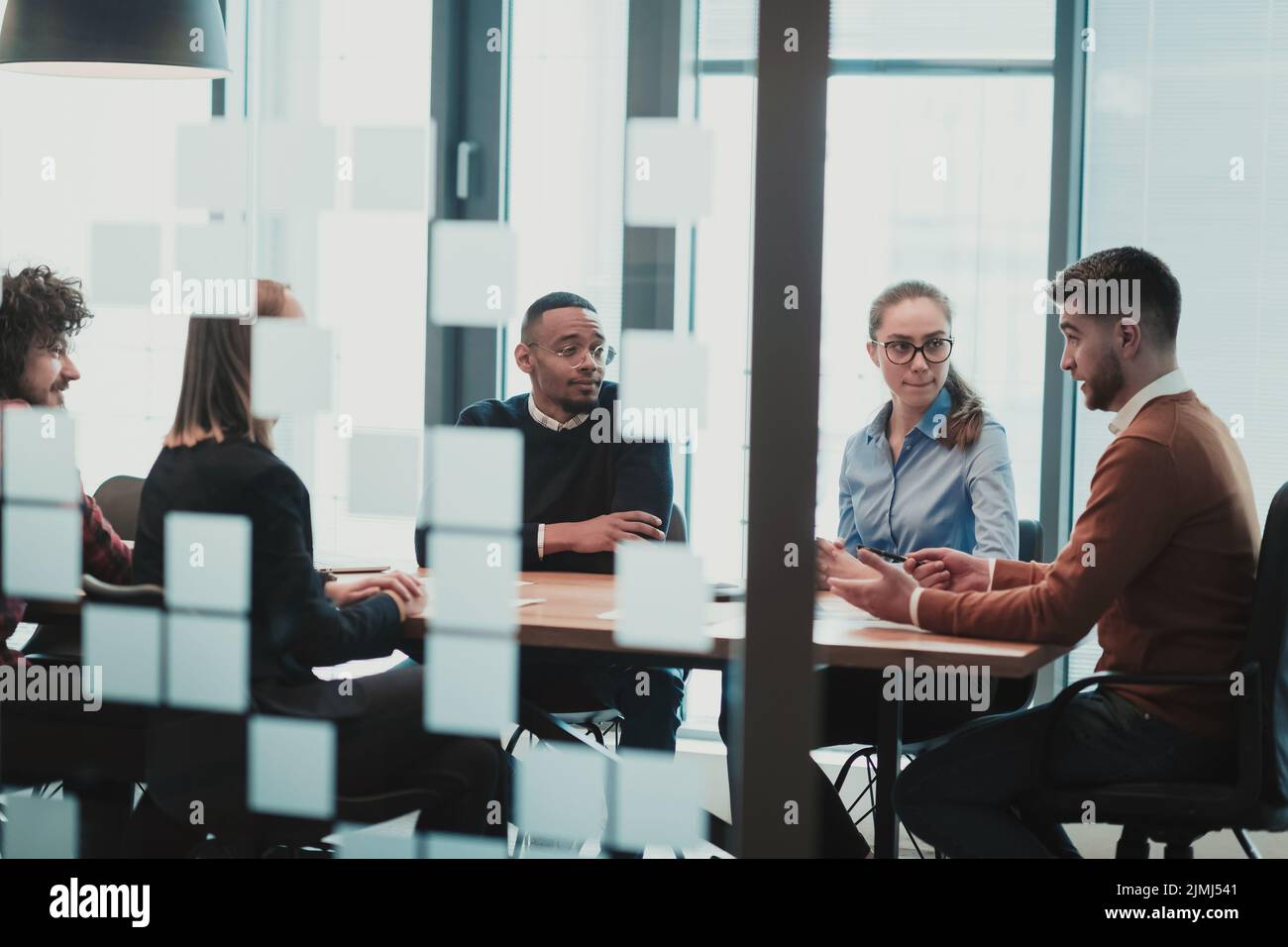 Successful team. Group of young multi-ethnic business people working ...