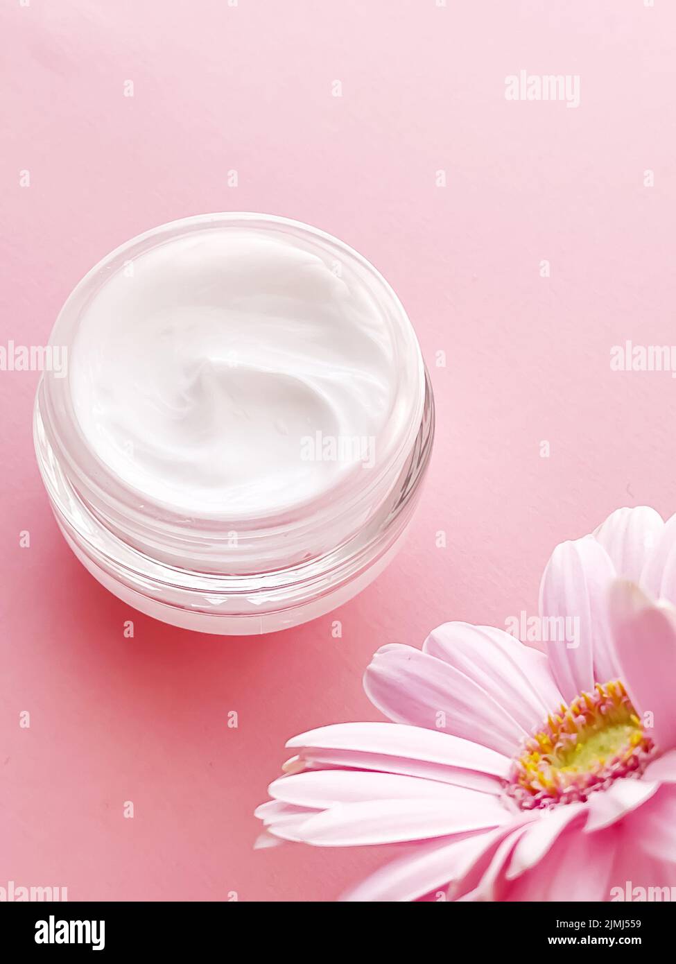 Face cream jar and flower, beauty, skincare and cosmetic product Stock ...