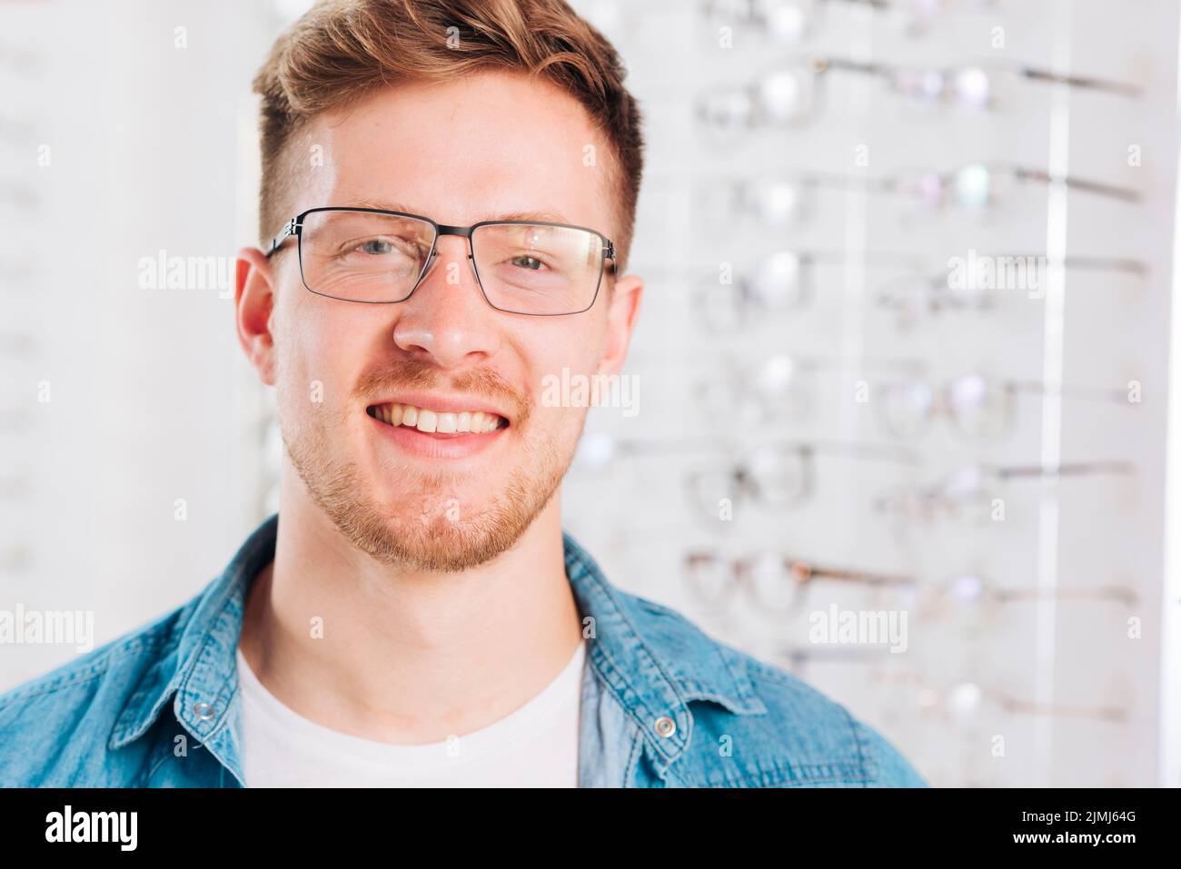 Ophthalmologist giving glasses vision correction hi-res stock ...