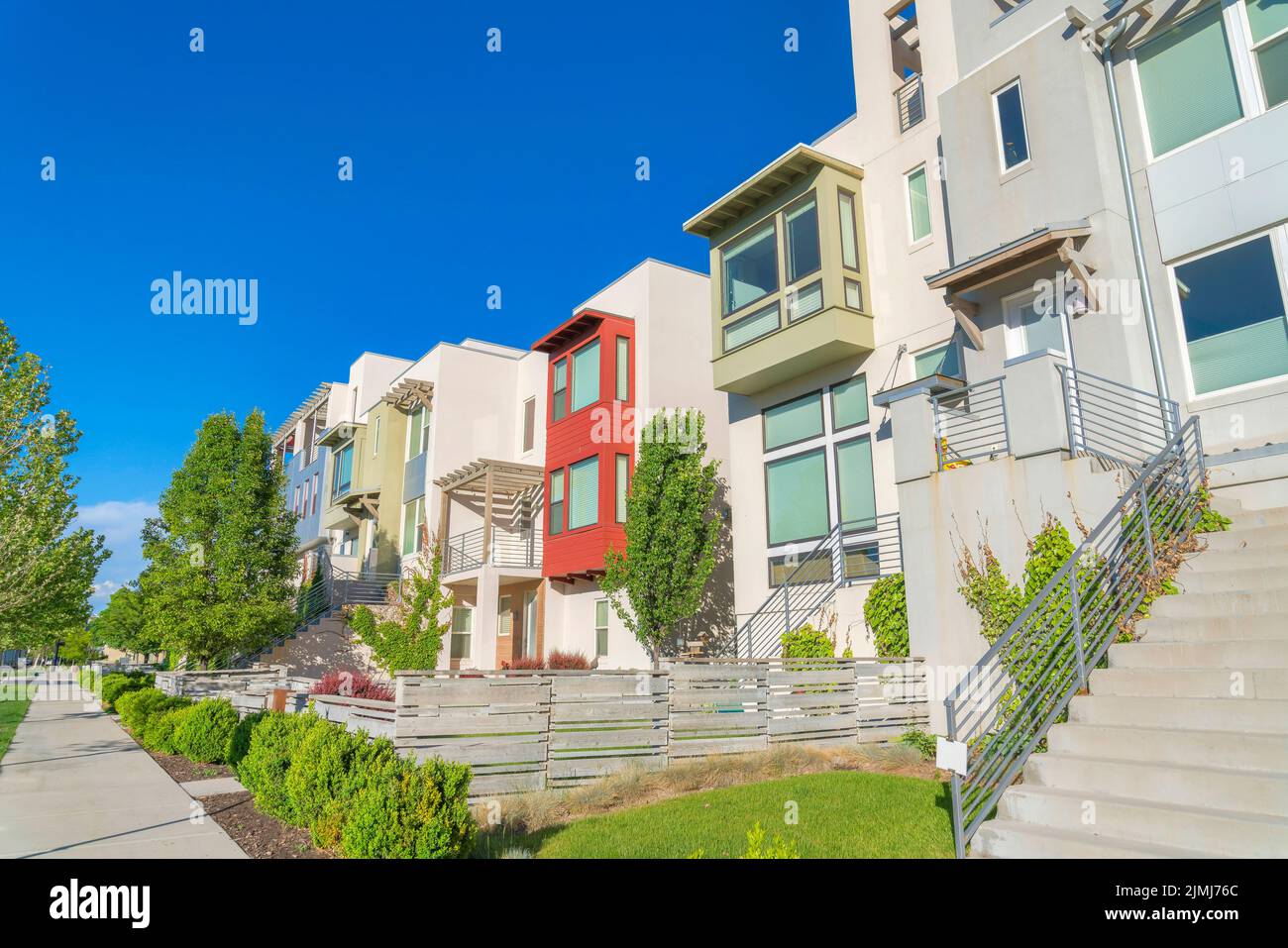 Complex multi-storey residential buildings with stairs at the front ...