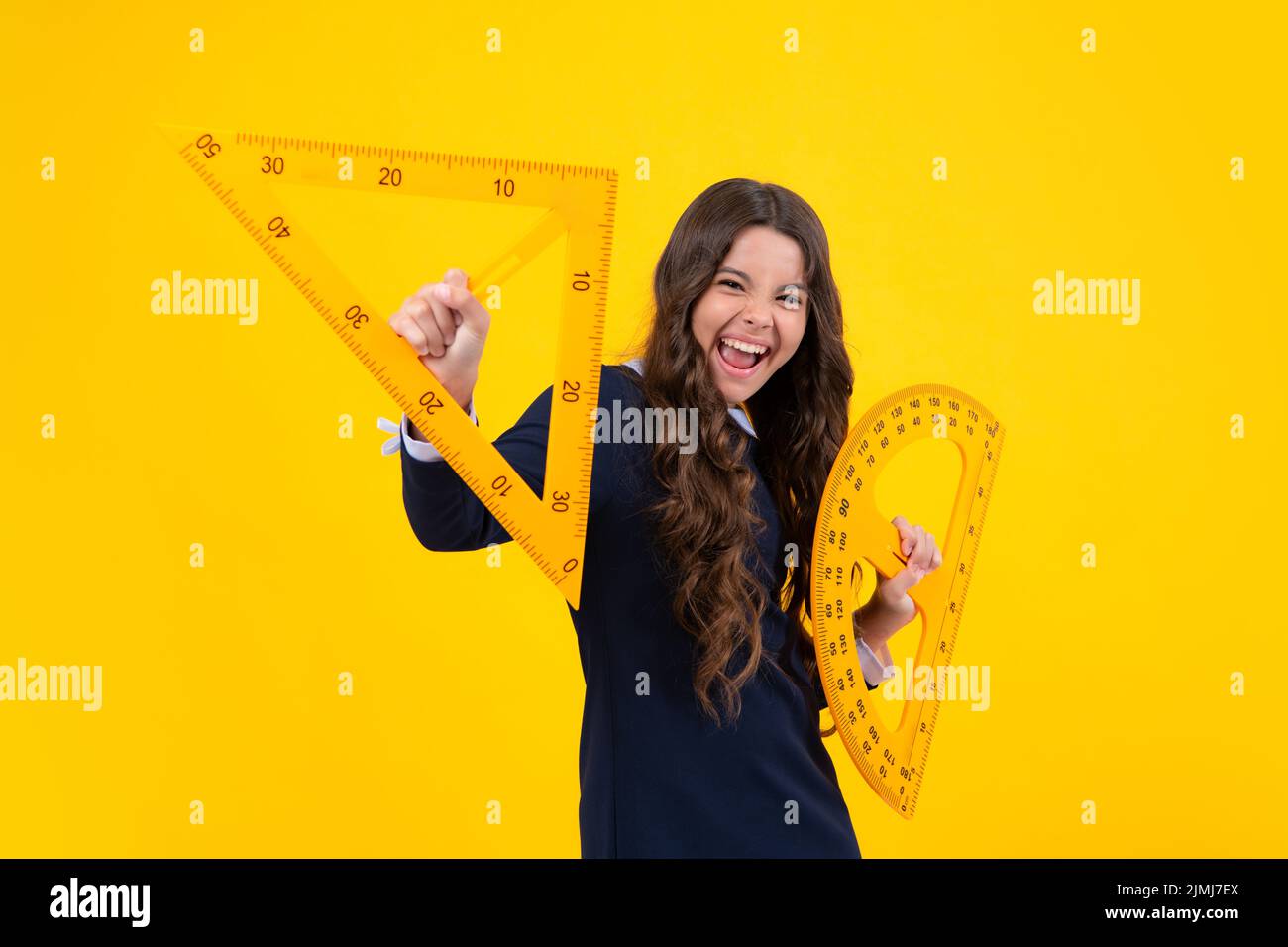 Excited face. Teenager school girl study math or geometry lesson ...