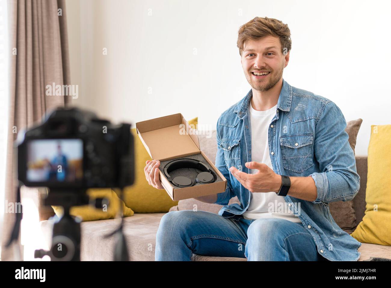 Handsome young man recording hi-res stock photography and images - Alamy