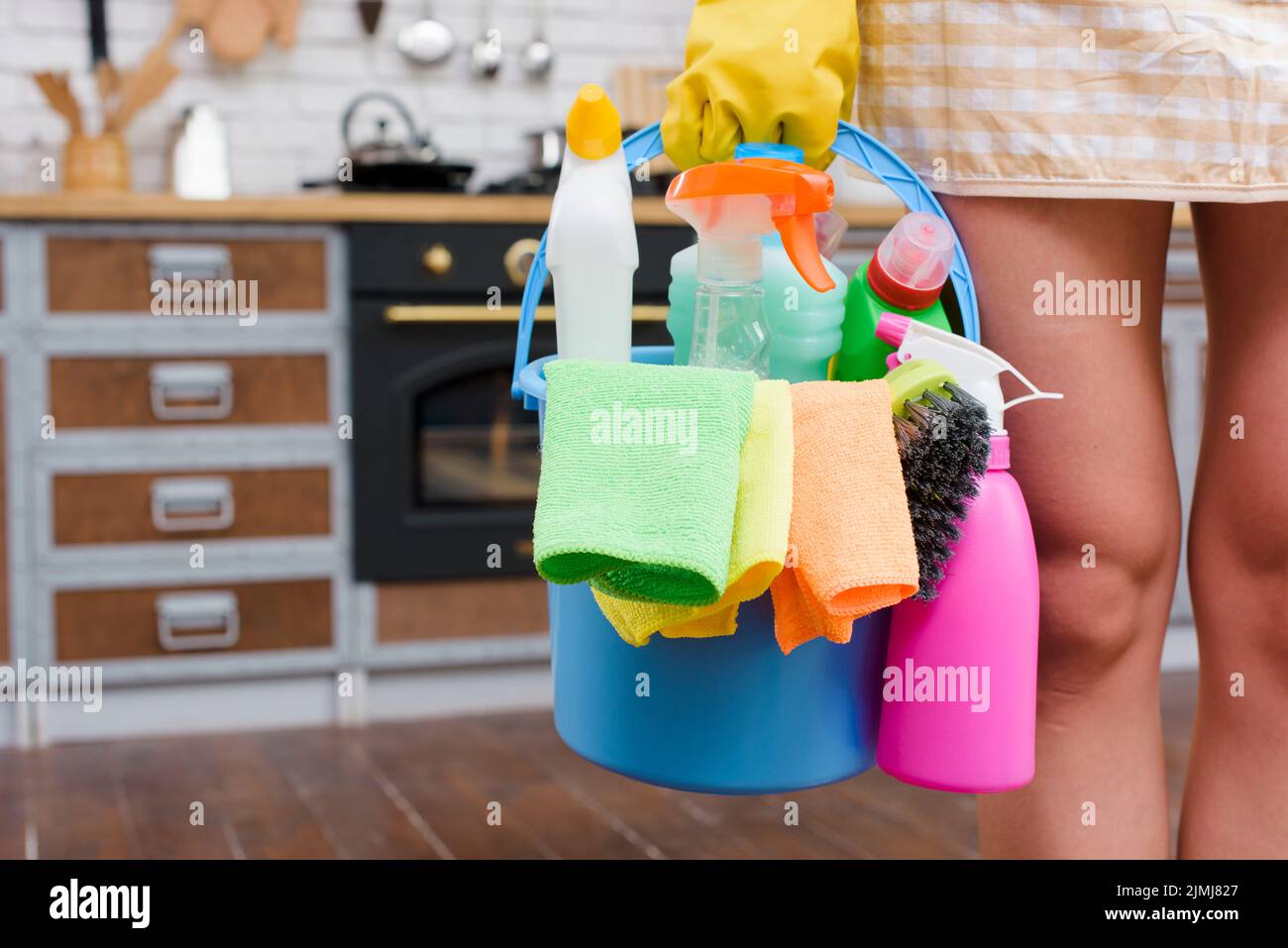 Person holding bucket hi-res stock photography and images - Alamy