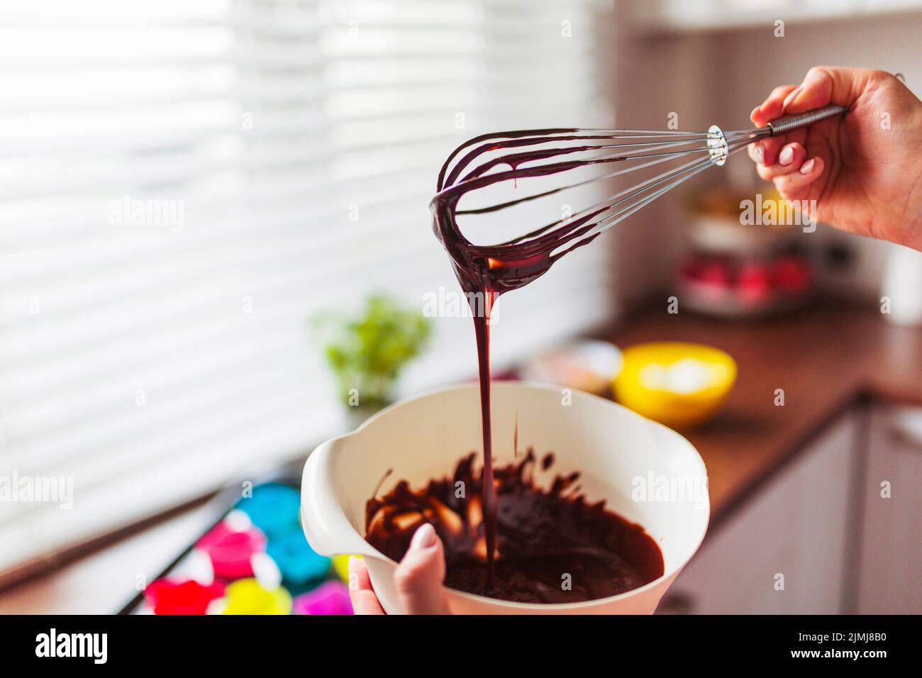 Woman hand whisk mixing hi-res stock photography and images - Alamy