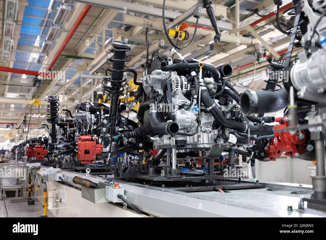 Photo of automobile production line. Welding car body. Modern car ...